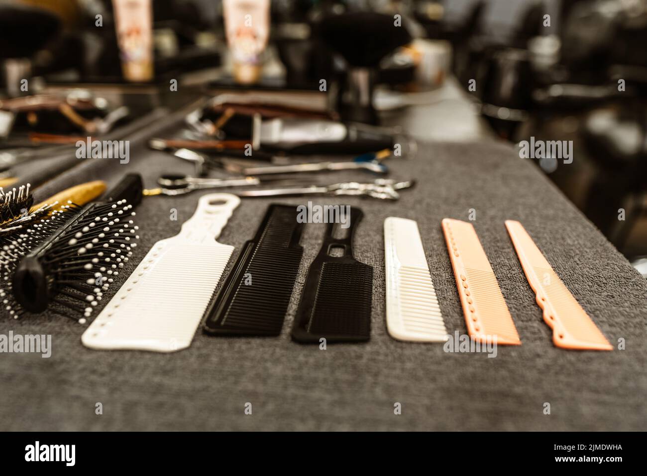 accessories for haircuts are on the shelf in the salon Stock Photo - Alamy
