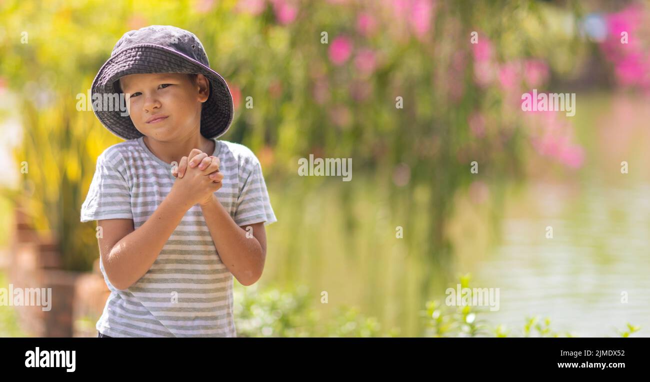 Outdoor portrait of a cute boy Stock Photo - Alamy