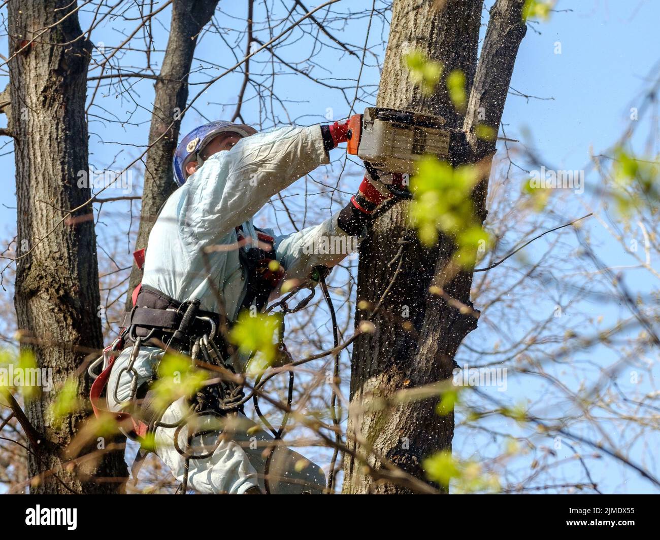Safety harness and helmet and worker hi-res stock photography and ...