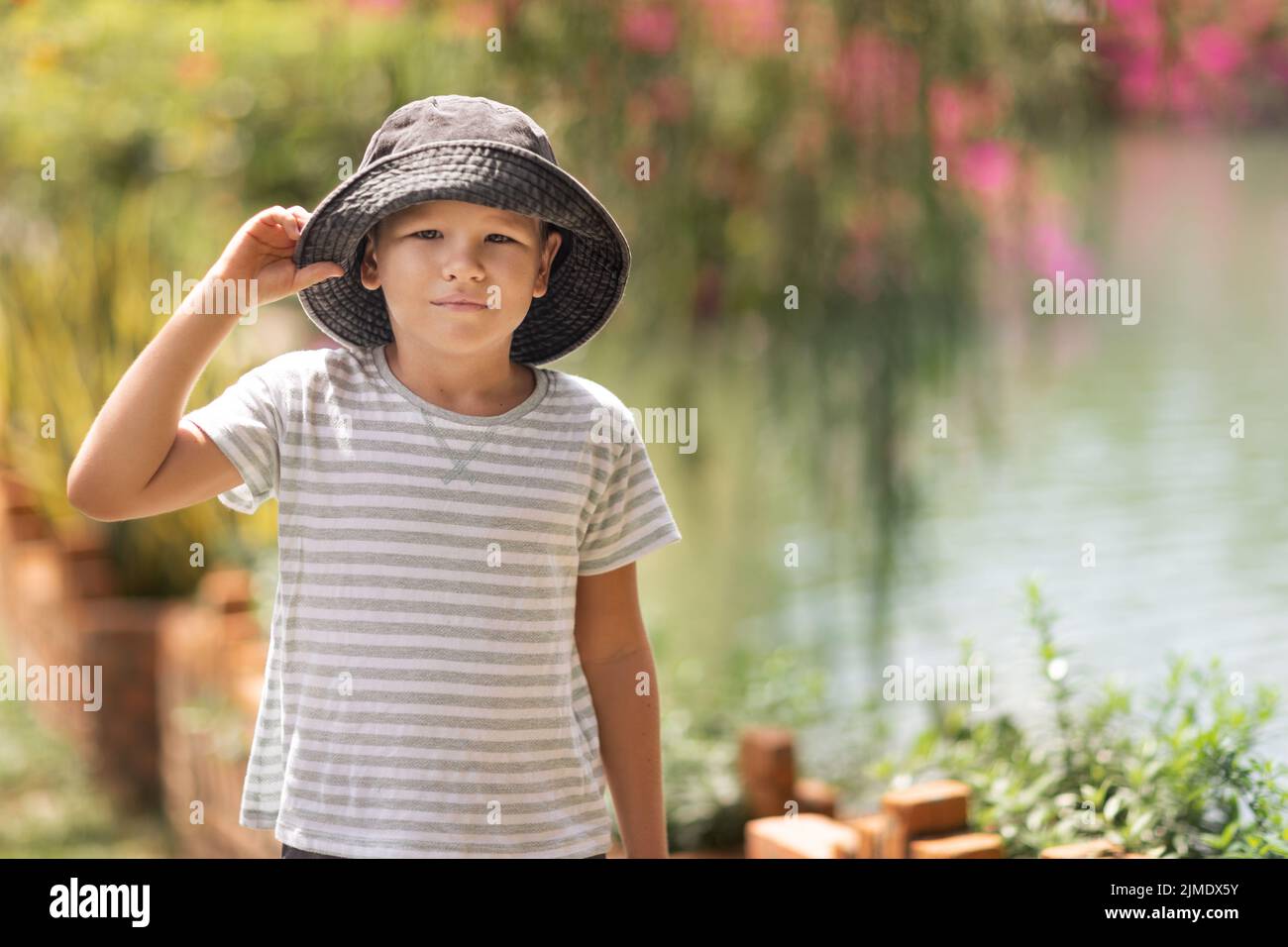 Outdoor portrait of a cute boy Stock Photo - Alamy