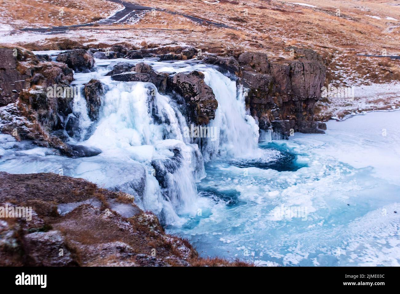 At the mountain kirkjufell and the waterfall Kirkjugellsfoss ...