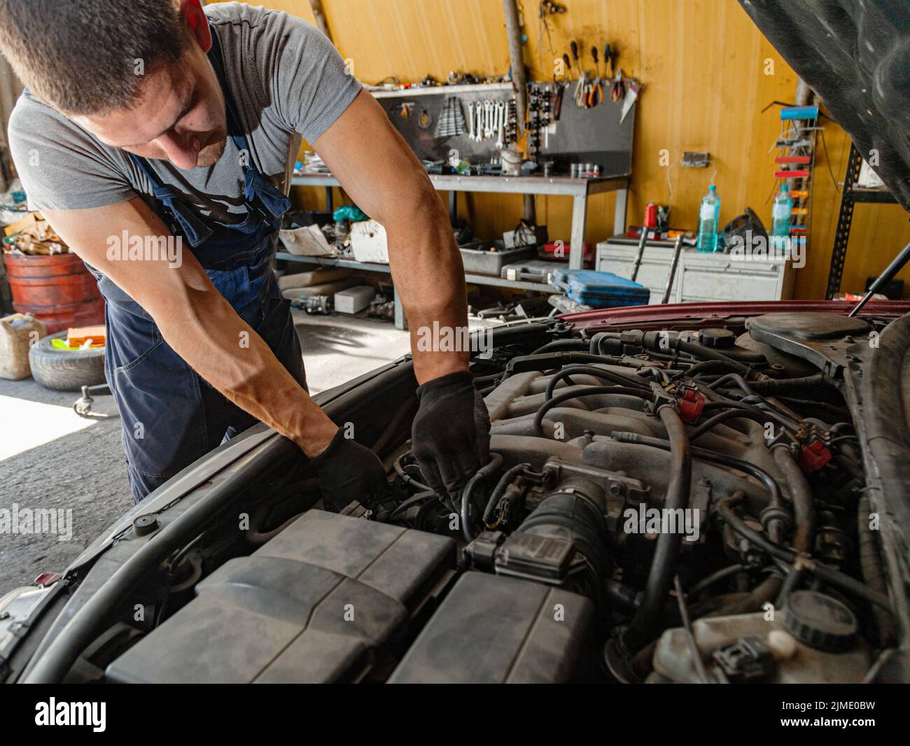 Technician car hood hi-res stock photography and images - Alamy