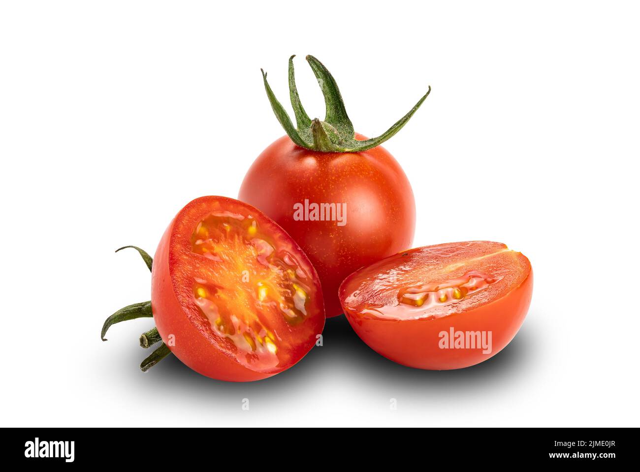 Side view a whole and two halves of ripe cherry tomatoes on white ...