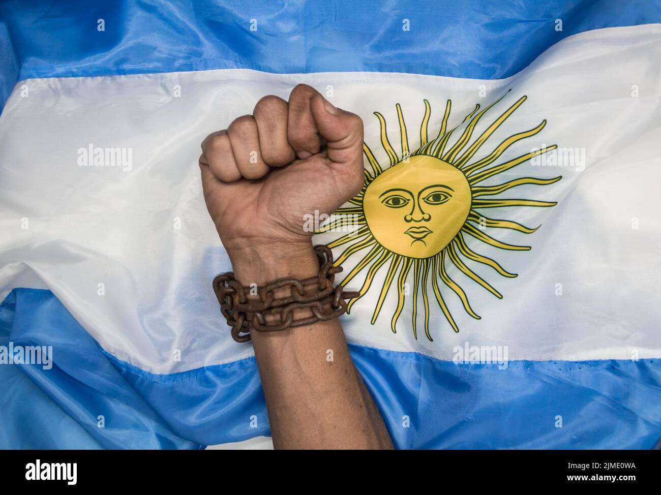 Fists that break the chains on the Argentine flag. Argentine revolution ...