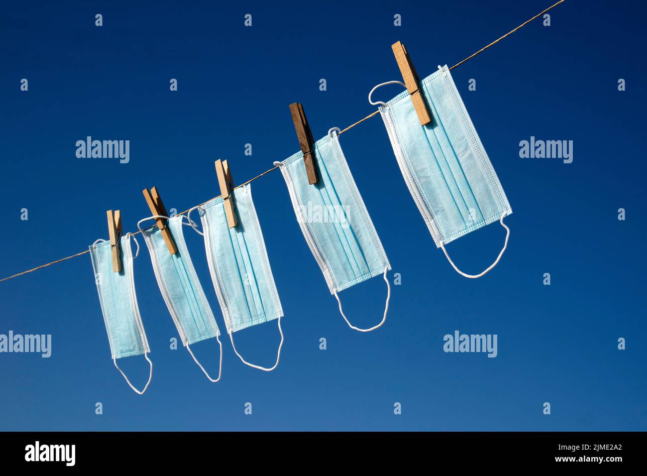 Wash and dry the anti Covid-19 masks Stock Photo - Alamy