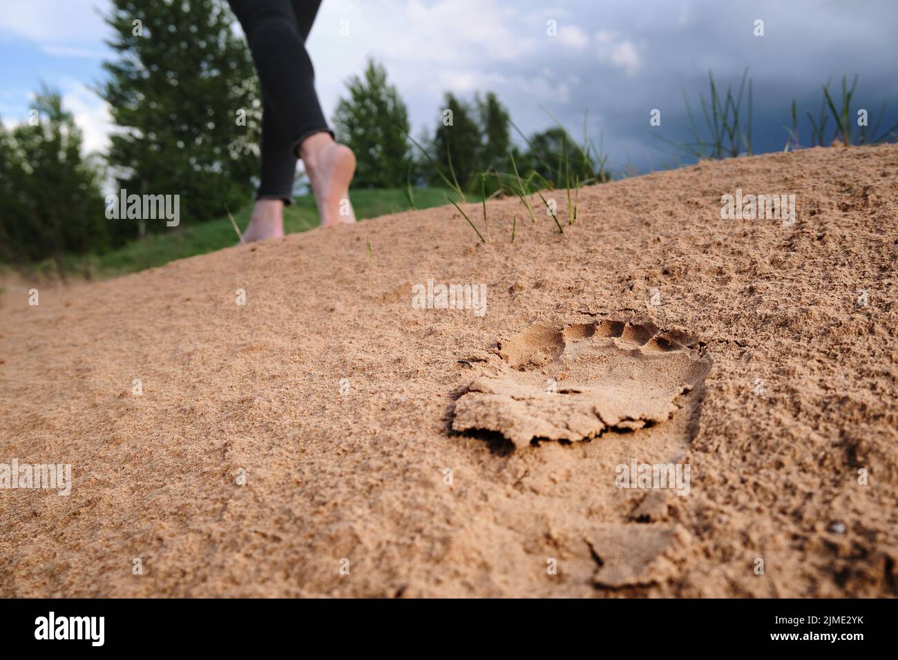 Barefoot woman jeans hi-res stock photography and images - Alamy