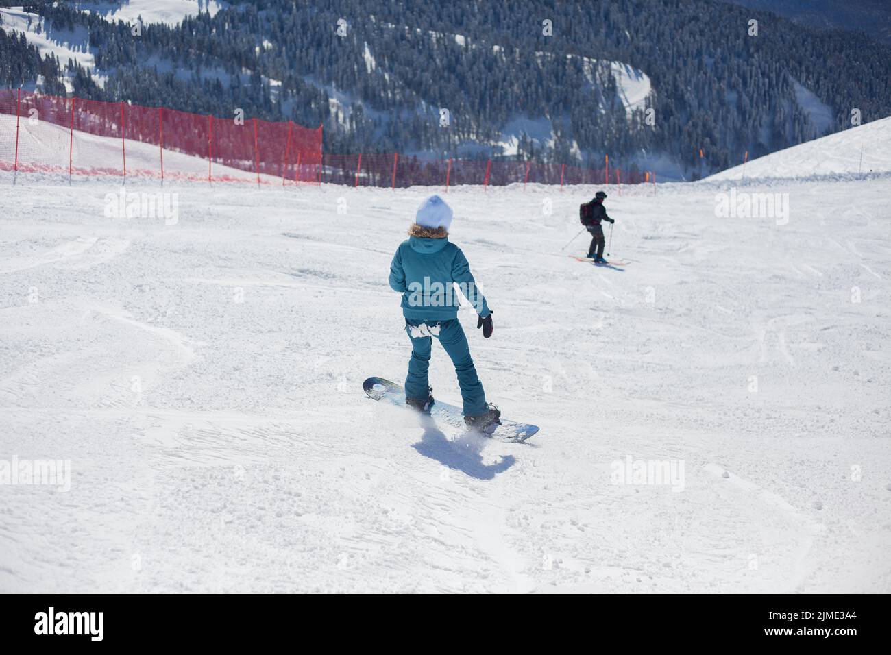 Snowboarder on a snowy slope Stock Photo - Alamy