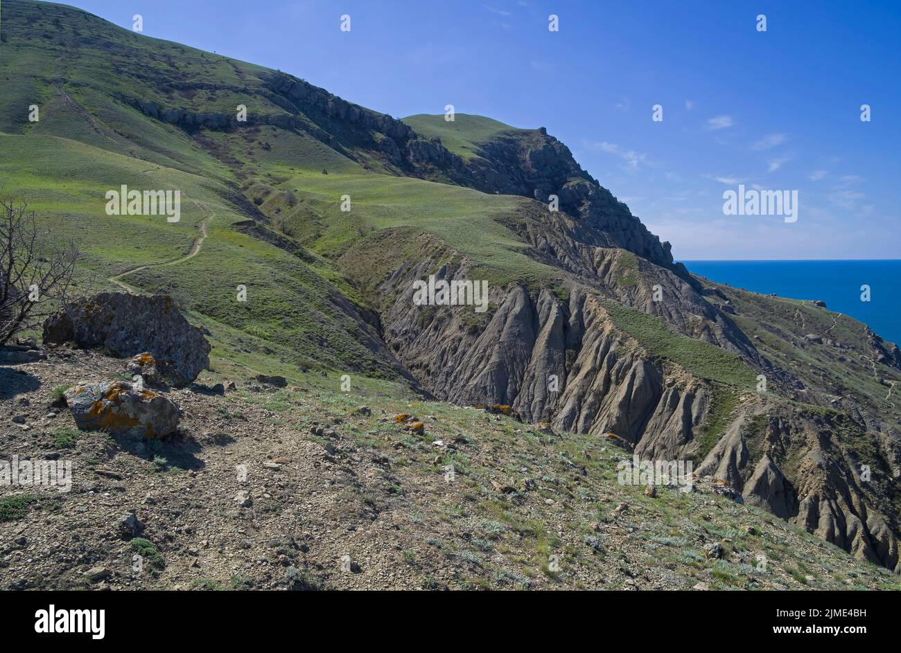 Traces of soil erosion and weathering on the mountain slope Stock Photo ...