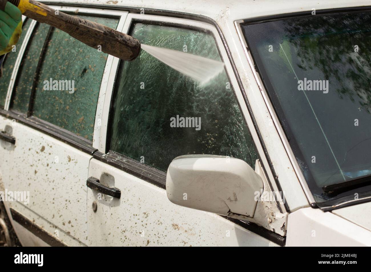 The car is washed at the car wash. Washing the car from dirt Stock ...
