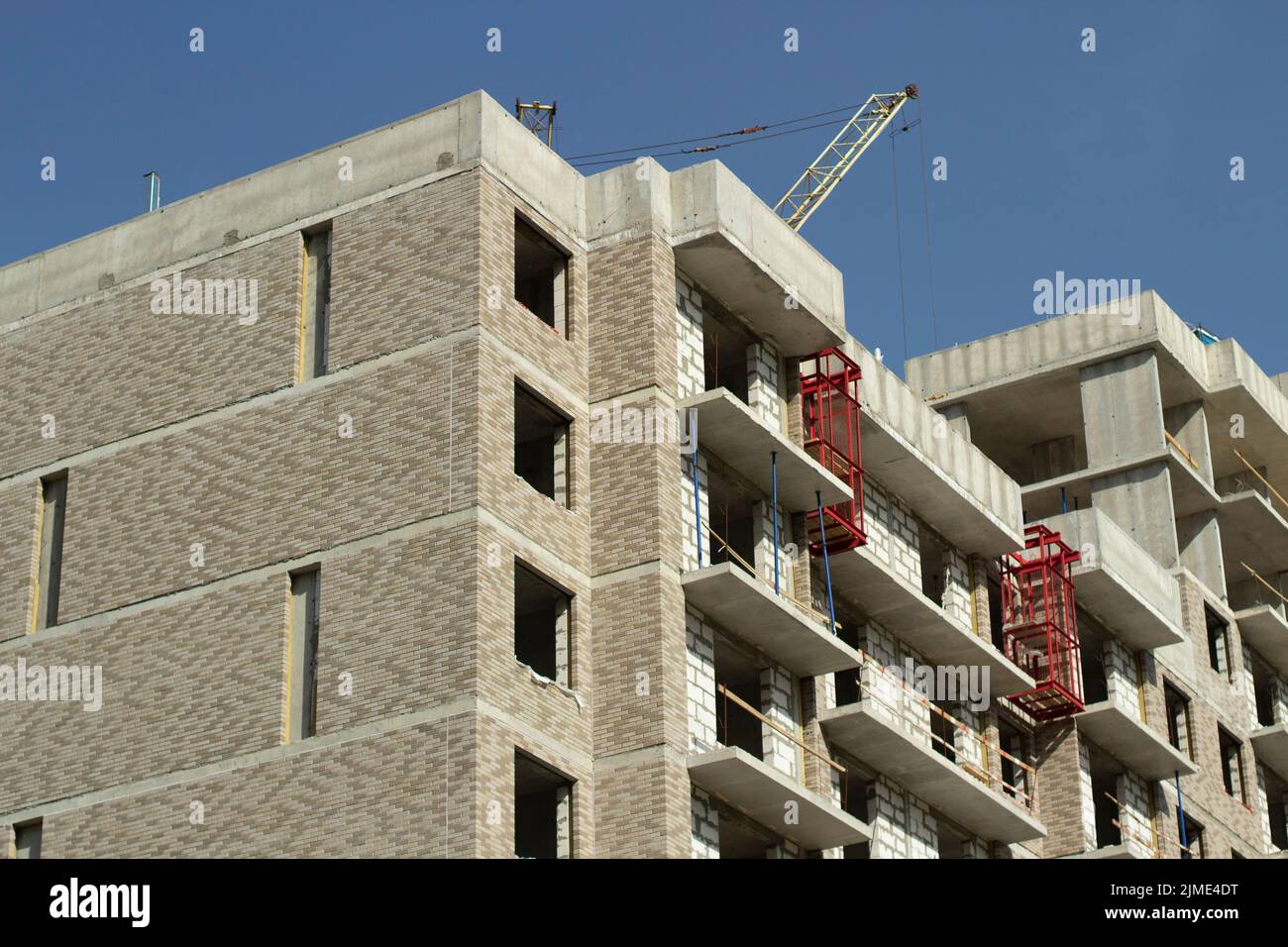 Building a house. Construction site near the house Stock Photo - Alamy
