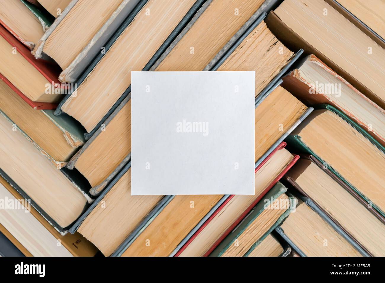A pattern of old books with a top view. Solid background with copy ...