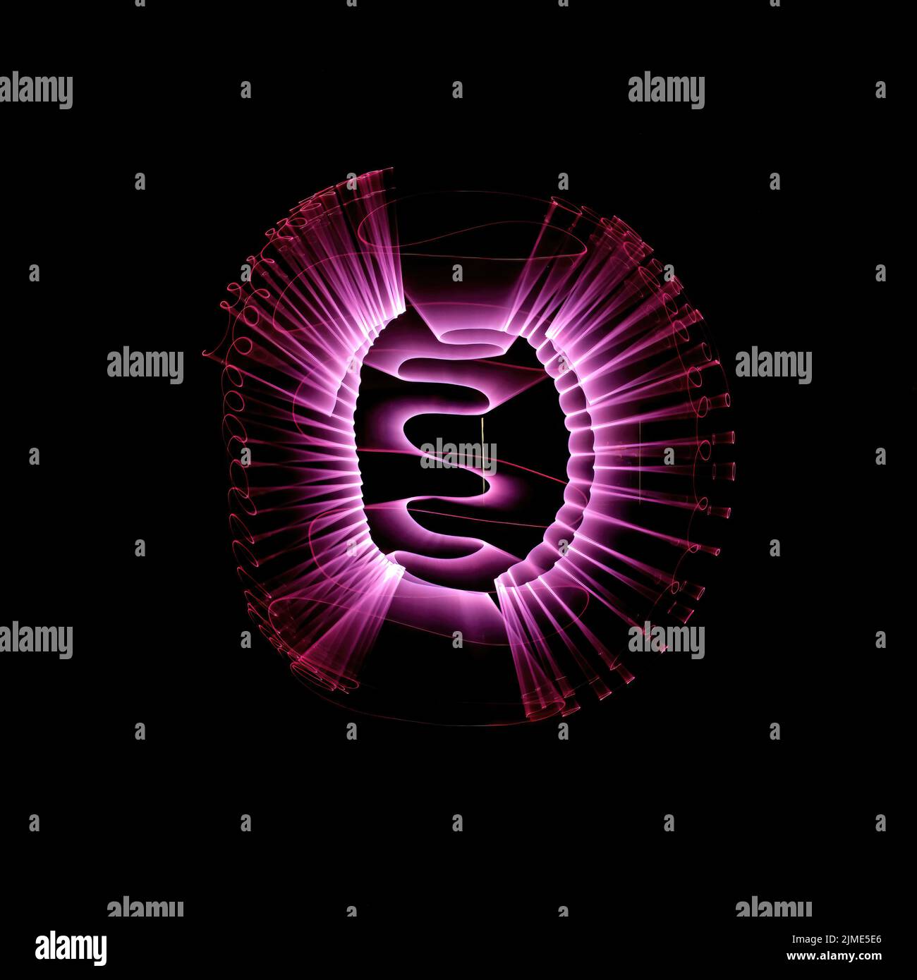 light painting at night with a slow shutter speed on the camera making ...