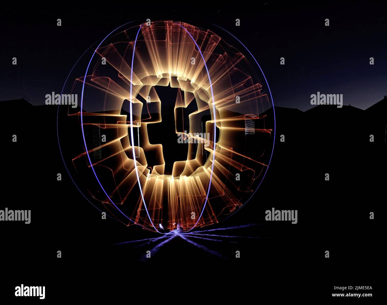 light painting at night with a slow shutter speed on the camera making ...