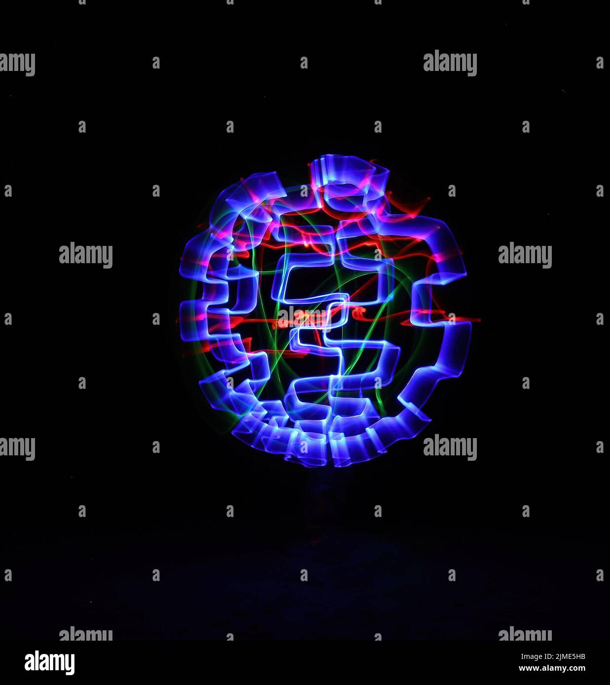 light painting at night with a slow shutter speed on the camera making ...