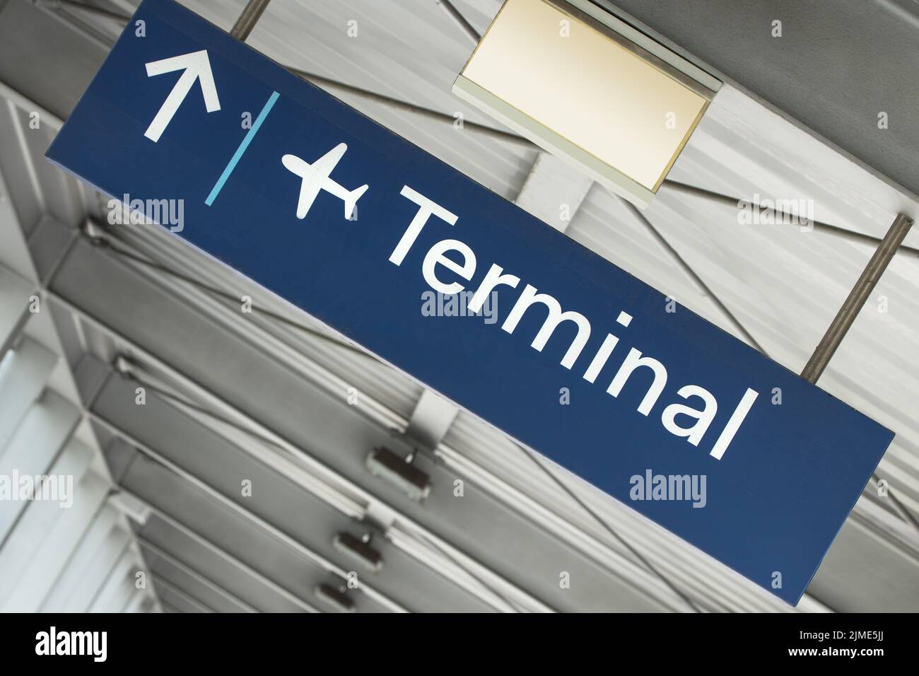 Plain airport terminal sign Stock Photo - Alamy