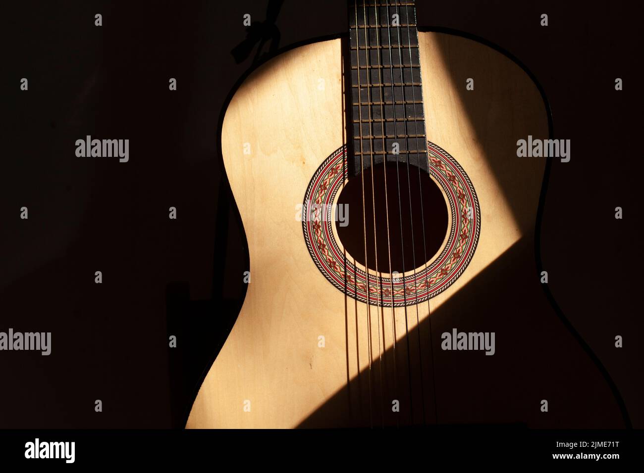 Acoustic guitar. A guitar with six strings Stock Photo - Alamy