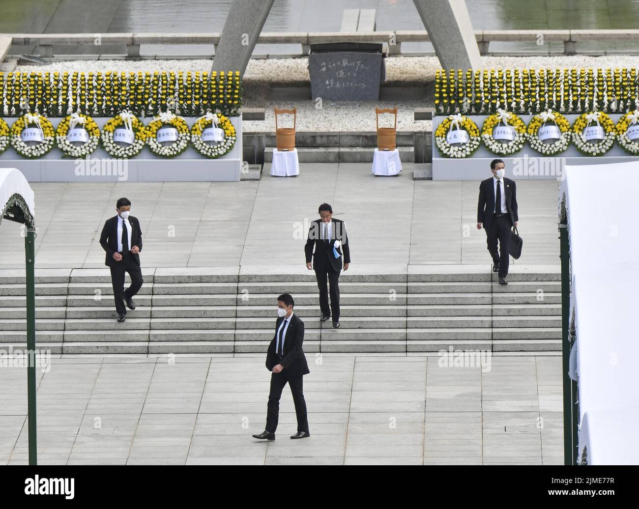 Japanese Prime Minister Fumio Kishida (C, back) is surrounded by ...