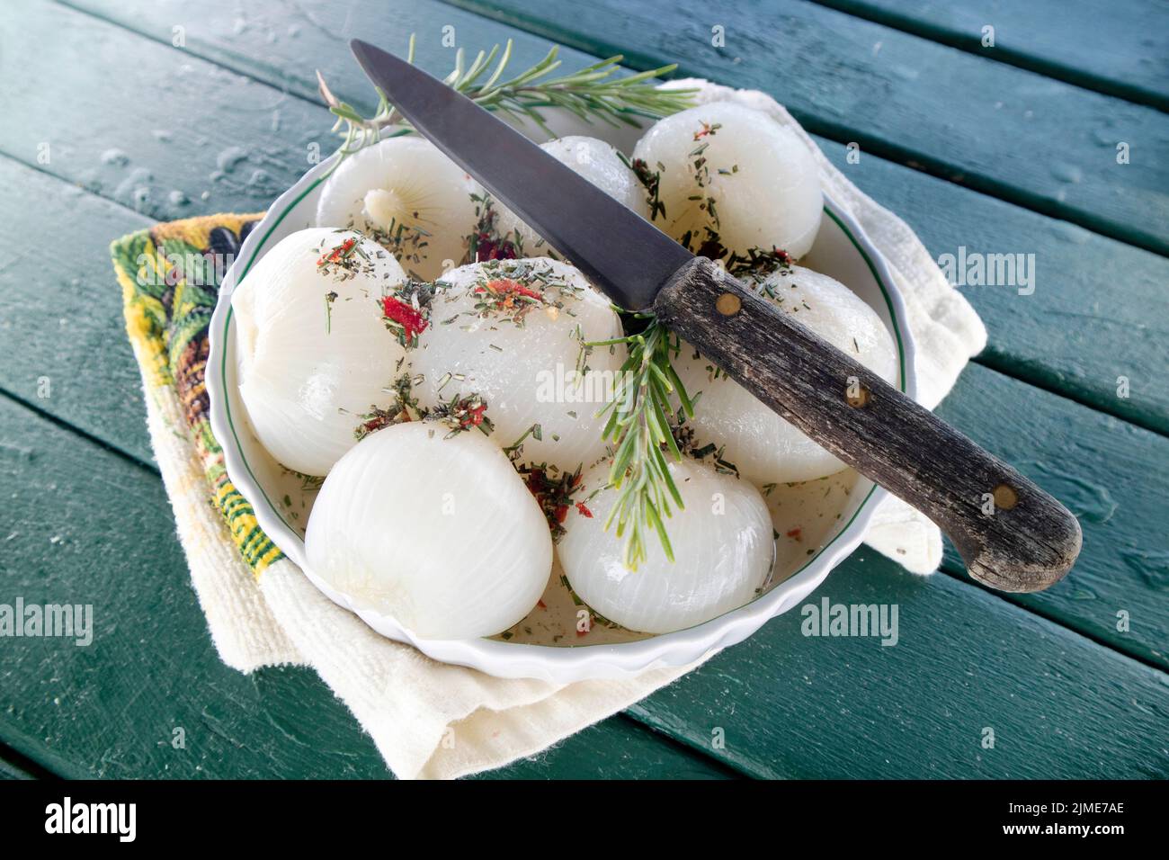 White onion boiled with rosemary and chili spores Stock Photo - Alamy