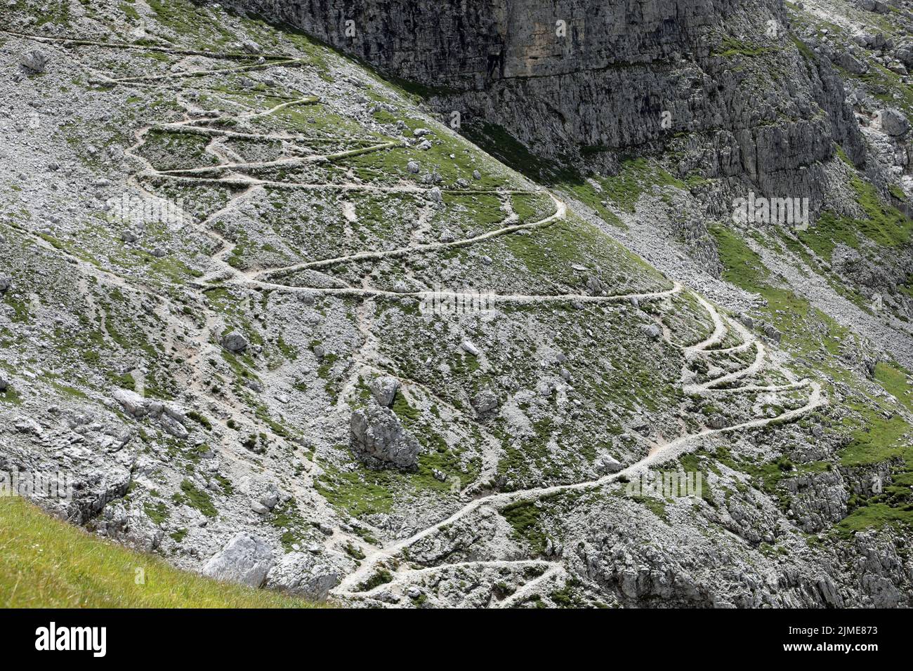 serpentine path in the Alps mountains with a zigzag pattern Stock Photo ...
