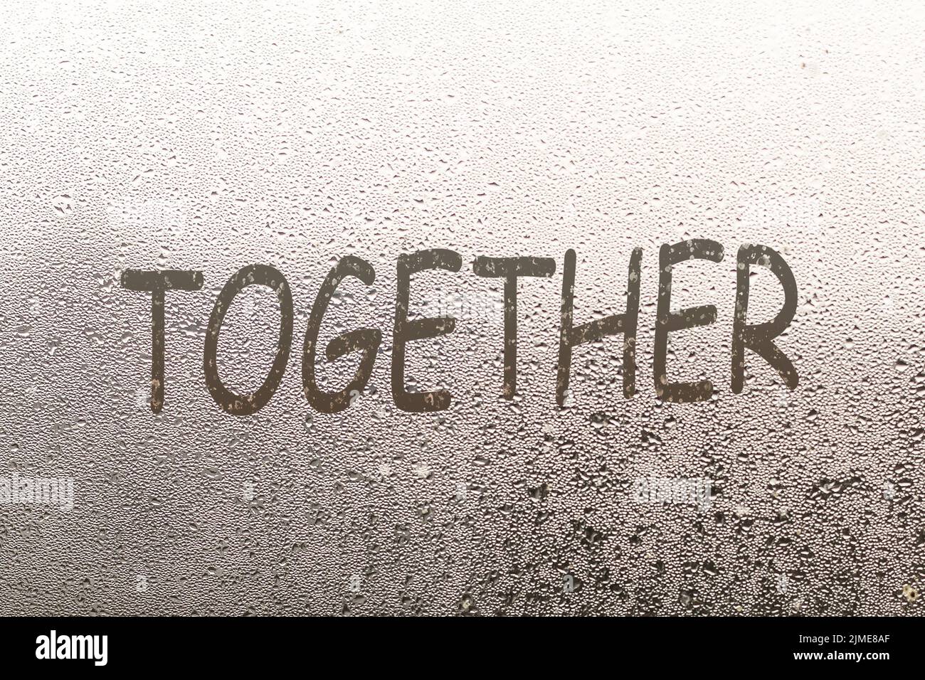 together written on a foggy window Stock Photo - Alamy
