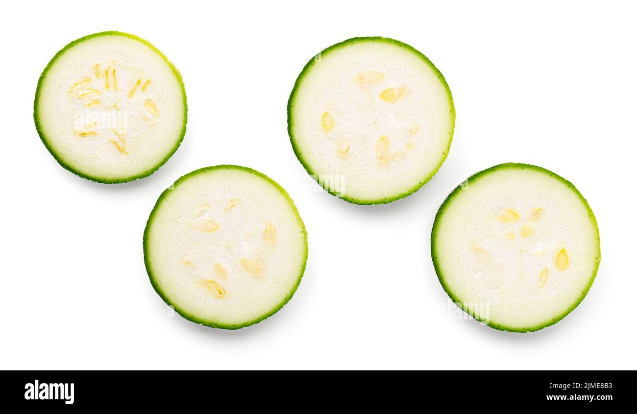 Zucchini Slice Isolated On White Fresh Pieces Stock Photo - Alamy