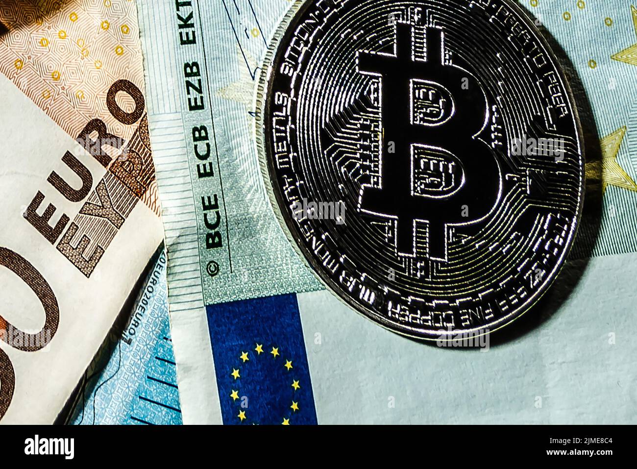 Bitcoin on the mock up cash. Cryptocurrency digital money Concept Stock ...