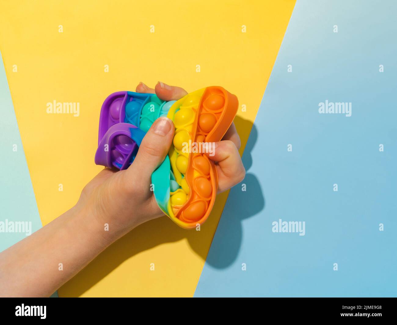 Female hand popit toy hi-res stock photography and images - Alamy
