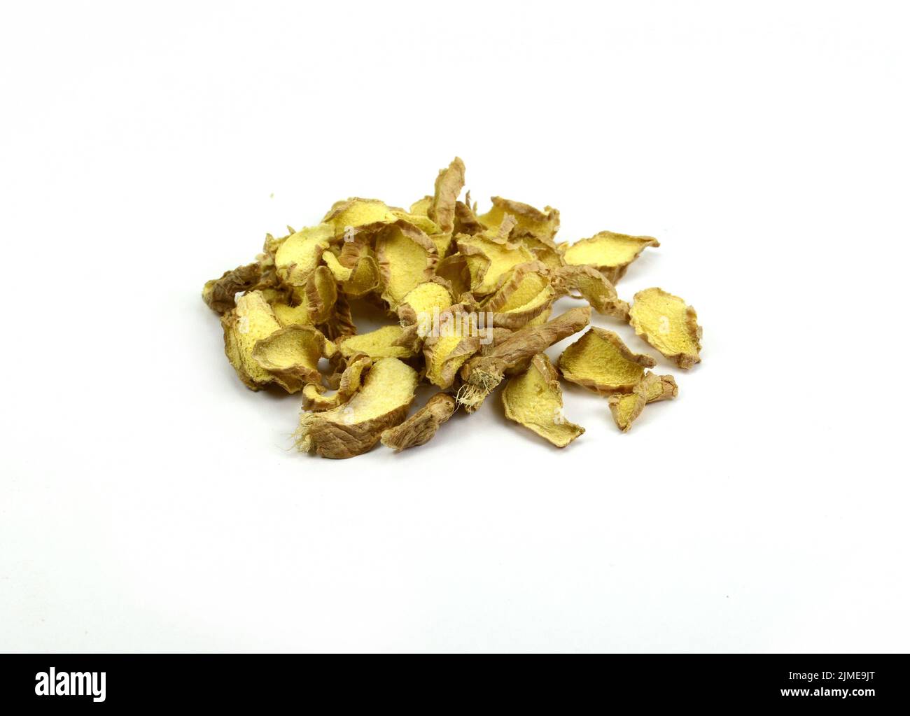 pile of dried ginger slices isolated on white background Stock Photo ...
