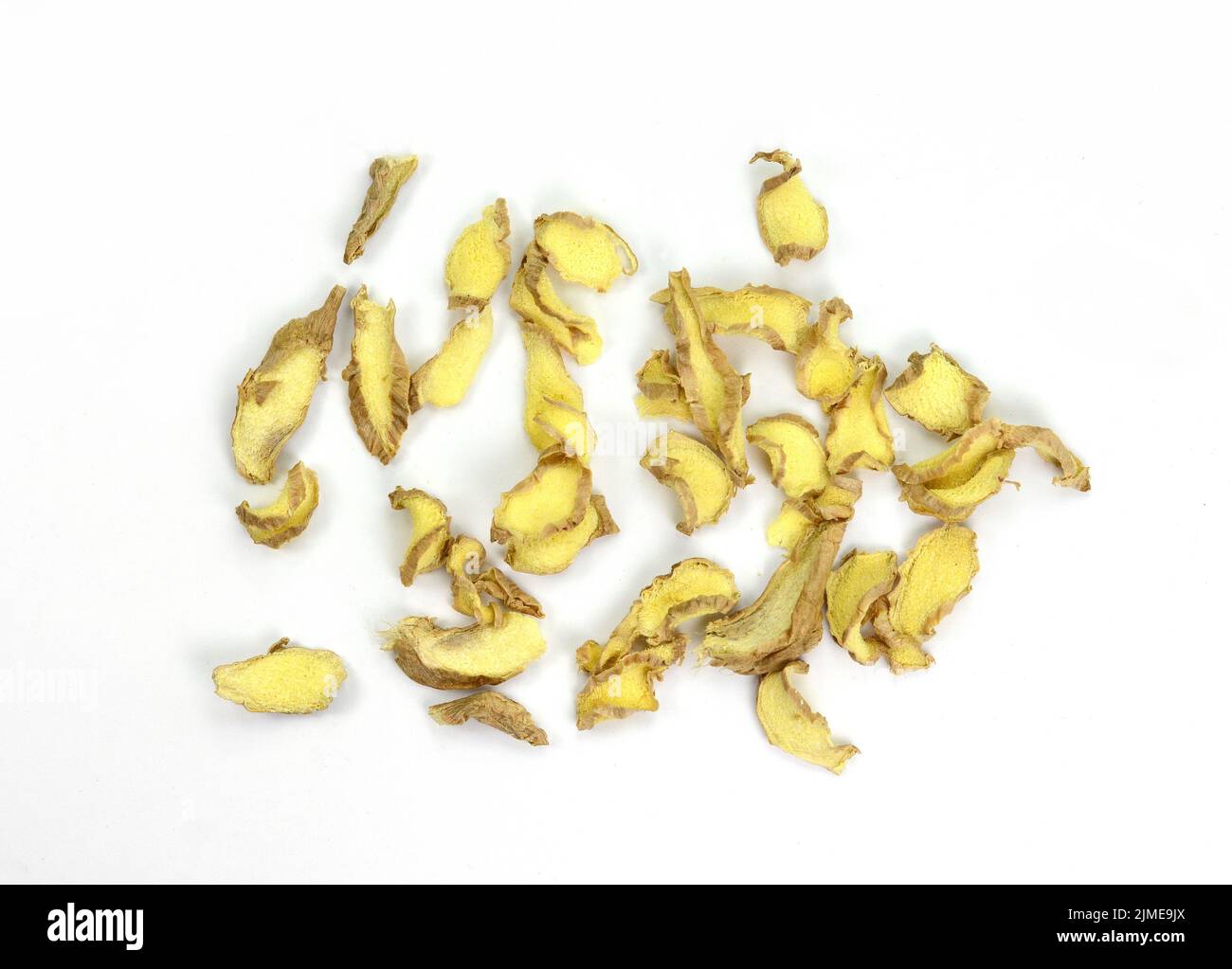 pile of dried ginger slices isolated on white background Stock Photo ...