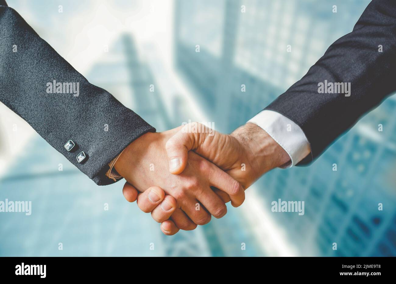 Businessmen handshake - business meeting and partnership concept copy ...
