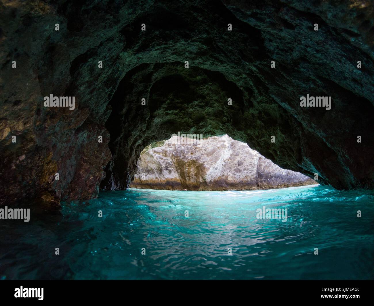 Amazing rocks in clear blue water Stock Photo - Alamy