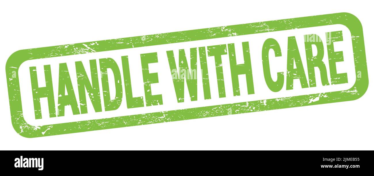 HANDLE WITH CARE text written on green rectangle stamp sign Stock Photo ...