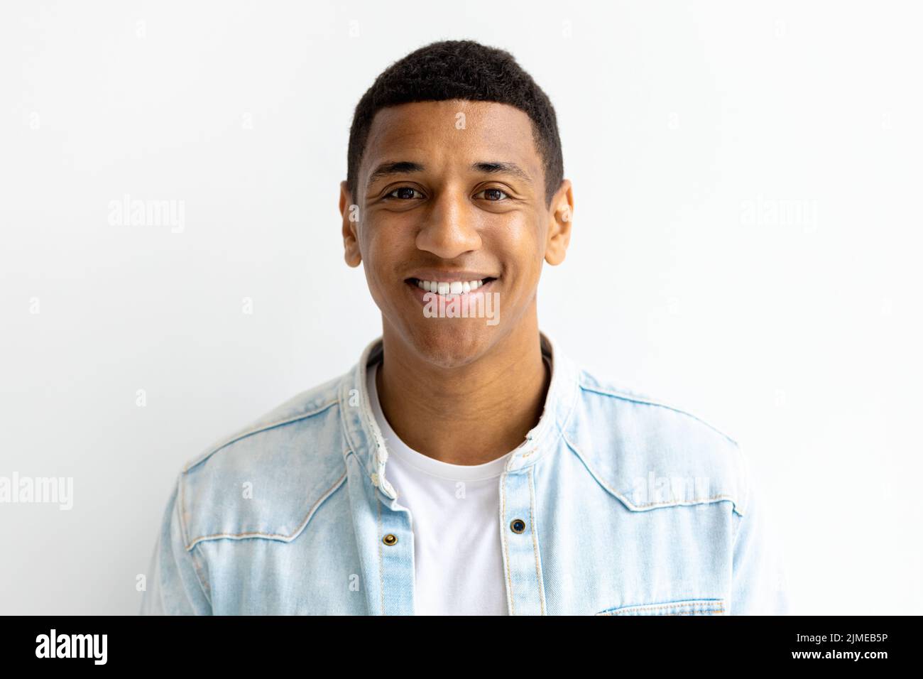 happy smiling man looking at the camera and smiles friendly Young ...