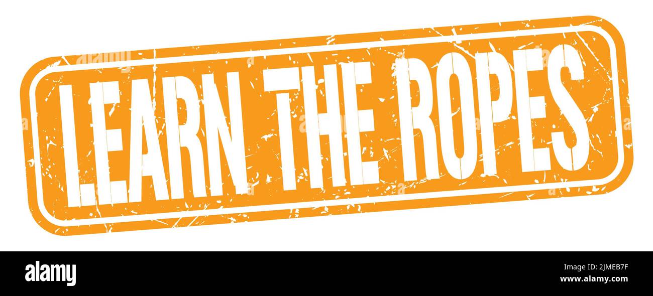 LEARN THE ROPES text written on orange grungy stamp sign Stock Photo ...