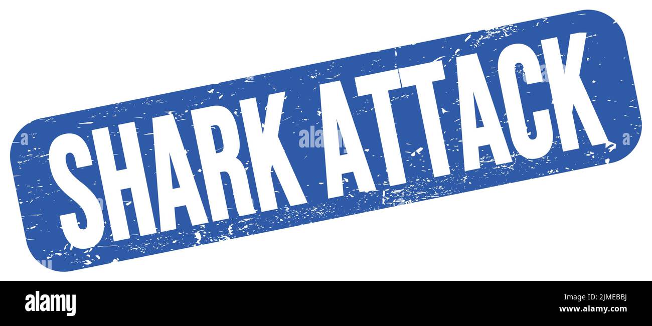 SHARK ATTACK text written on blue grungy stamp sign Stock Photo - Alamy