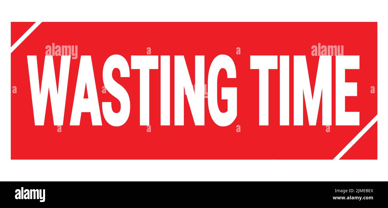 WASTING TIME text written on red grungy stamp sign Stock Photo - Alamy