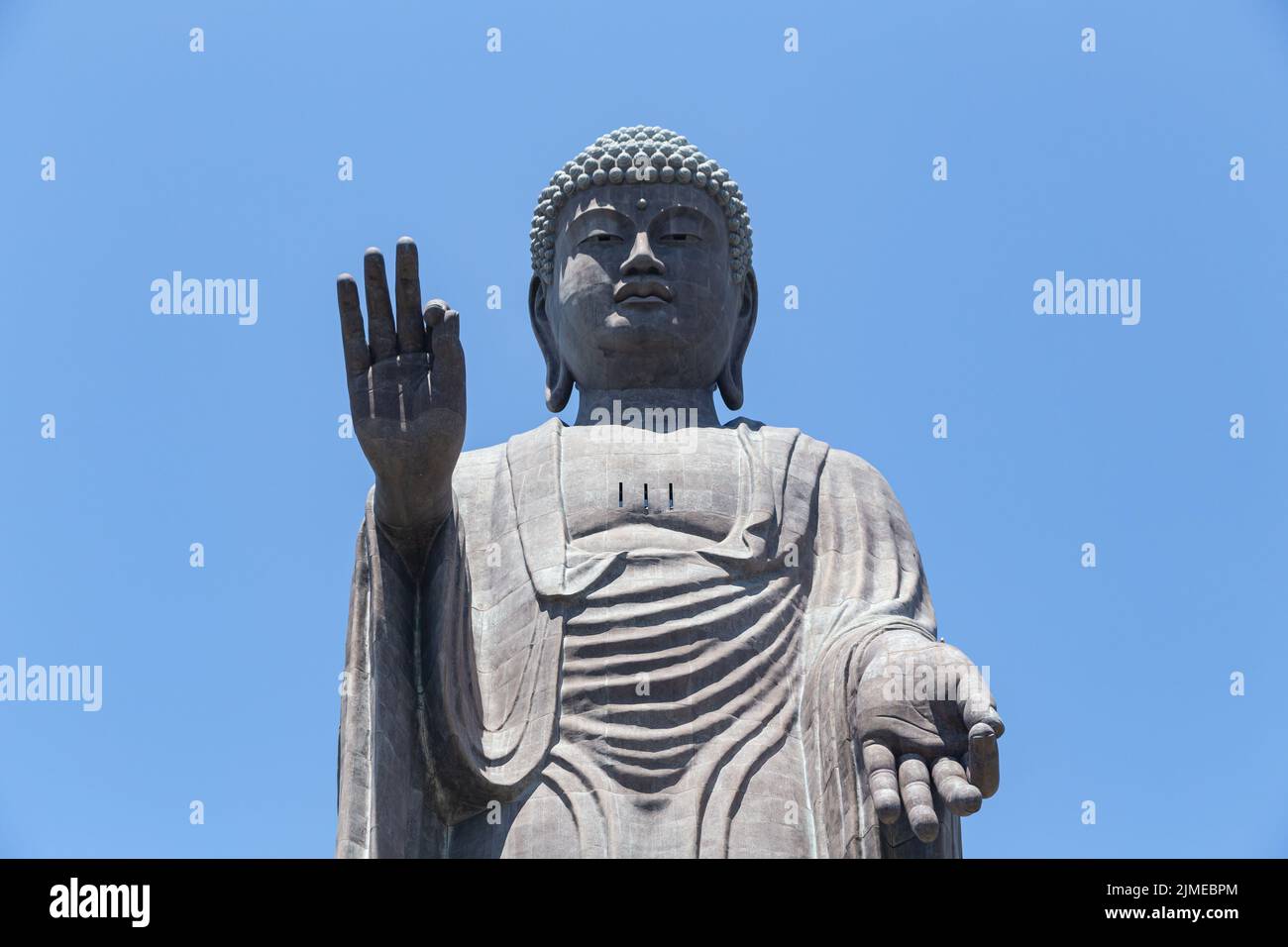 Close up shot, upper body and head of Biggest buddha, Ushiku Daibutsu ...