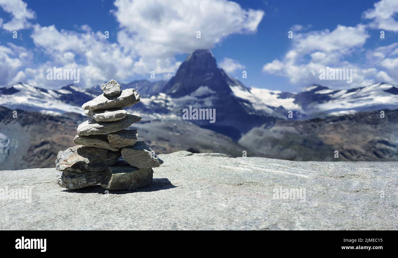 Stack of stones on top of the mountain. Pile of rocks stone and ...