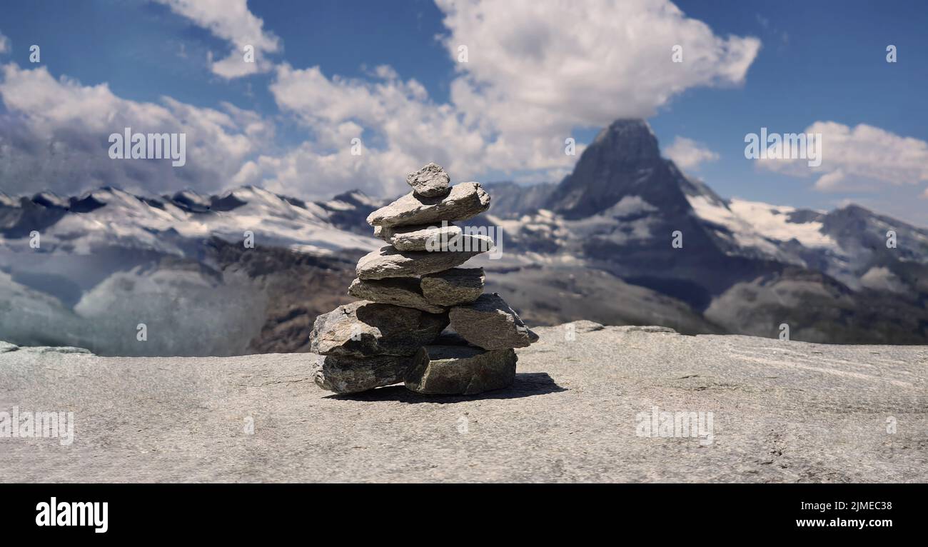 Stack of stones on top of the mountain. Pile of rocks stone and ...
