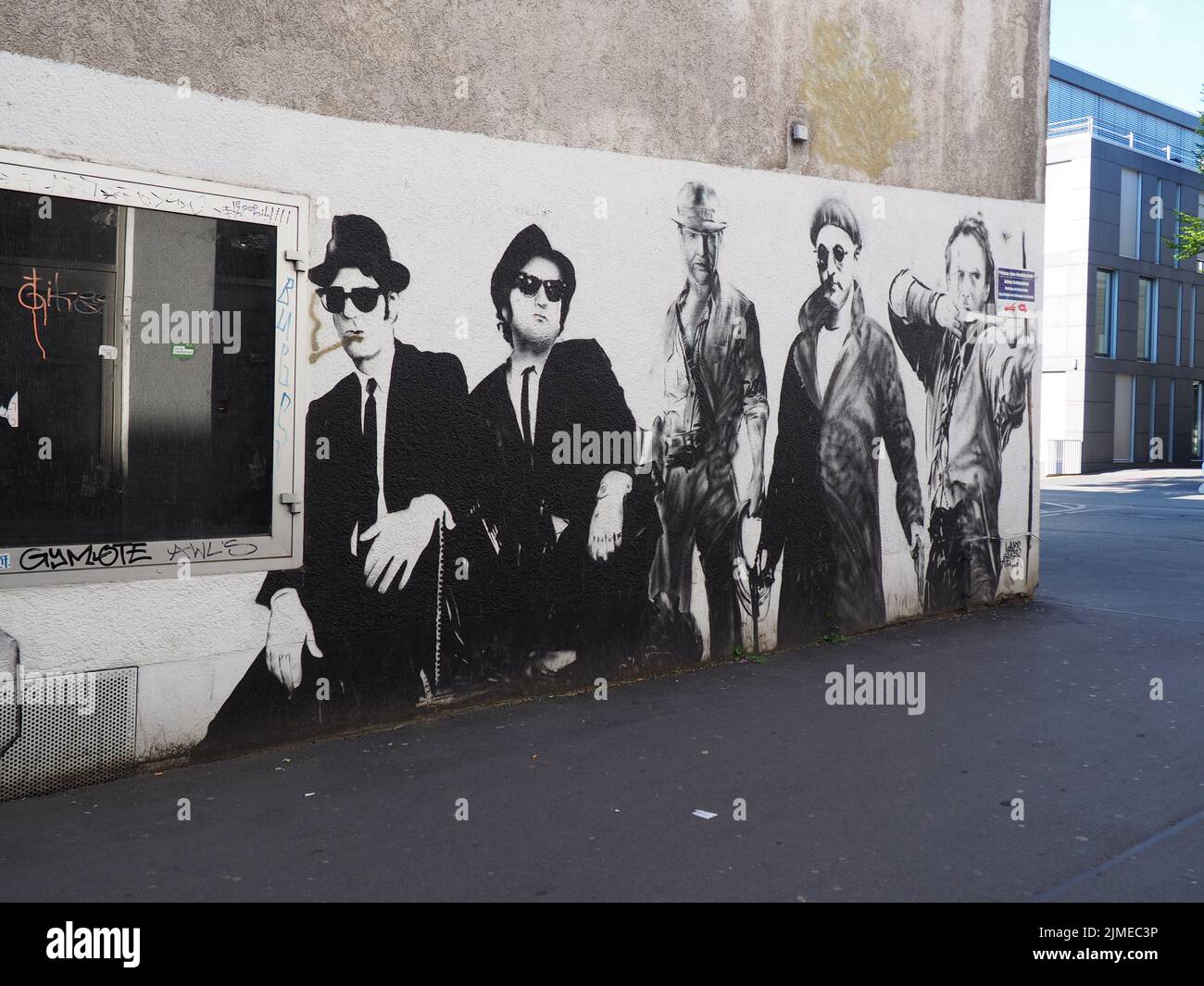 A black and white graffiti on Pali Cinema wall with Blues Brothers ...