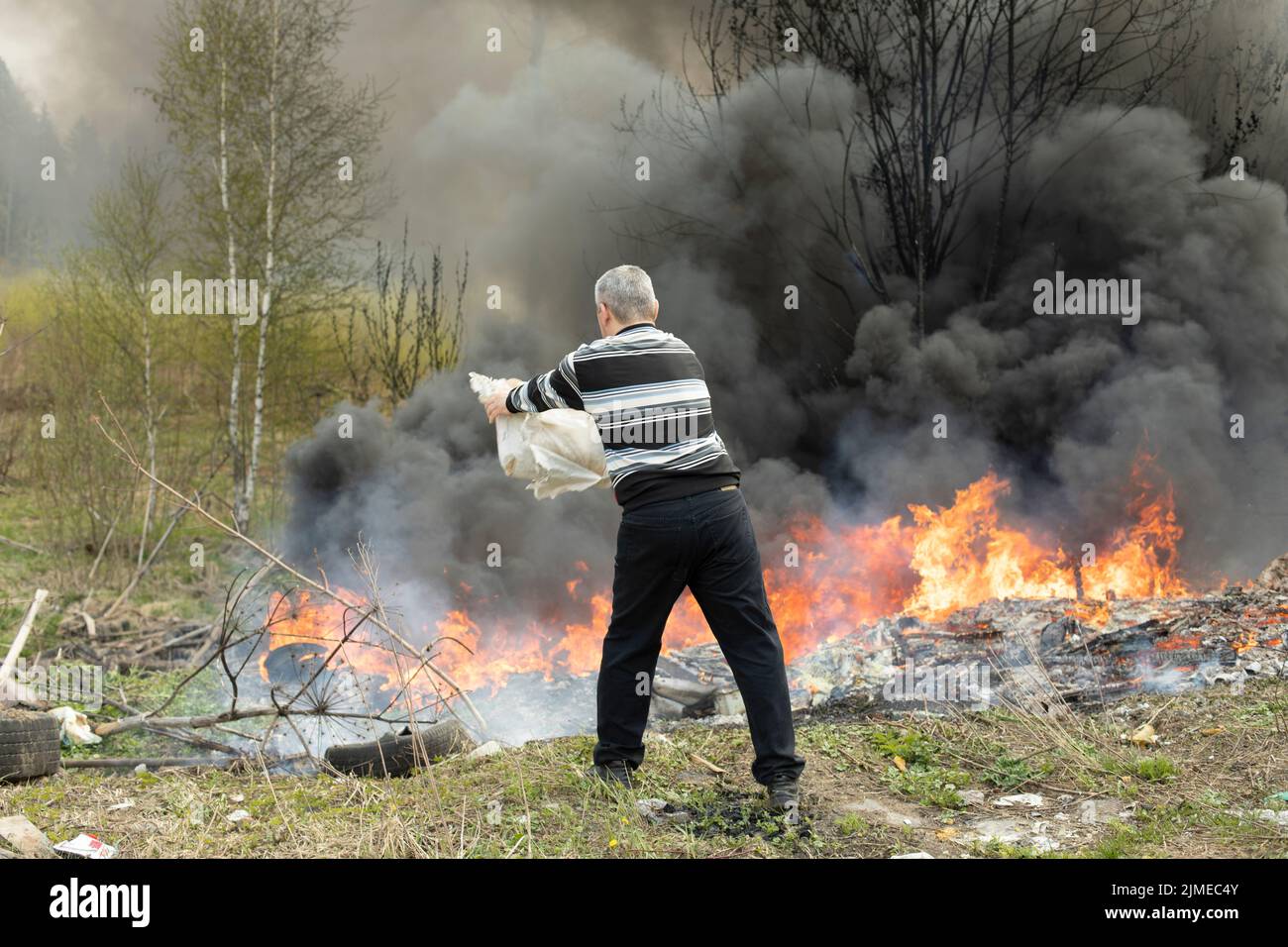 Man fire extinguishing hi-res stock photography and images - Alamy