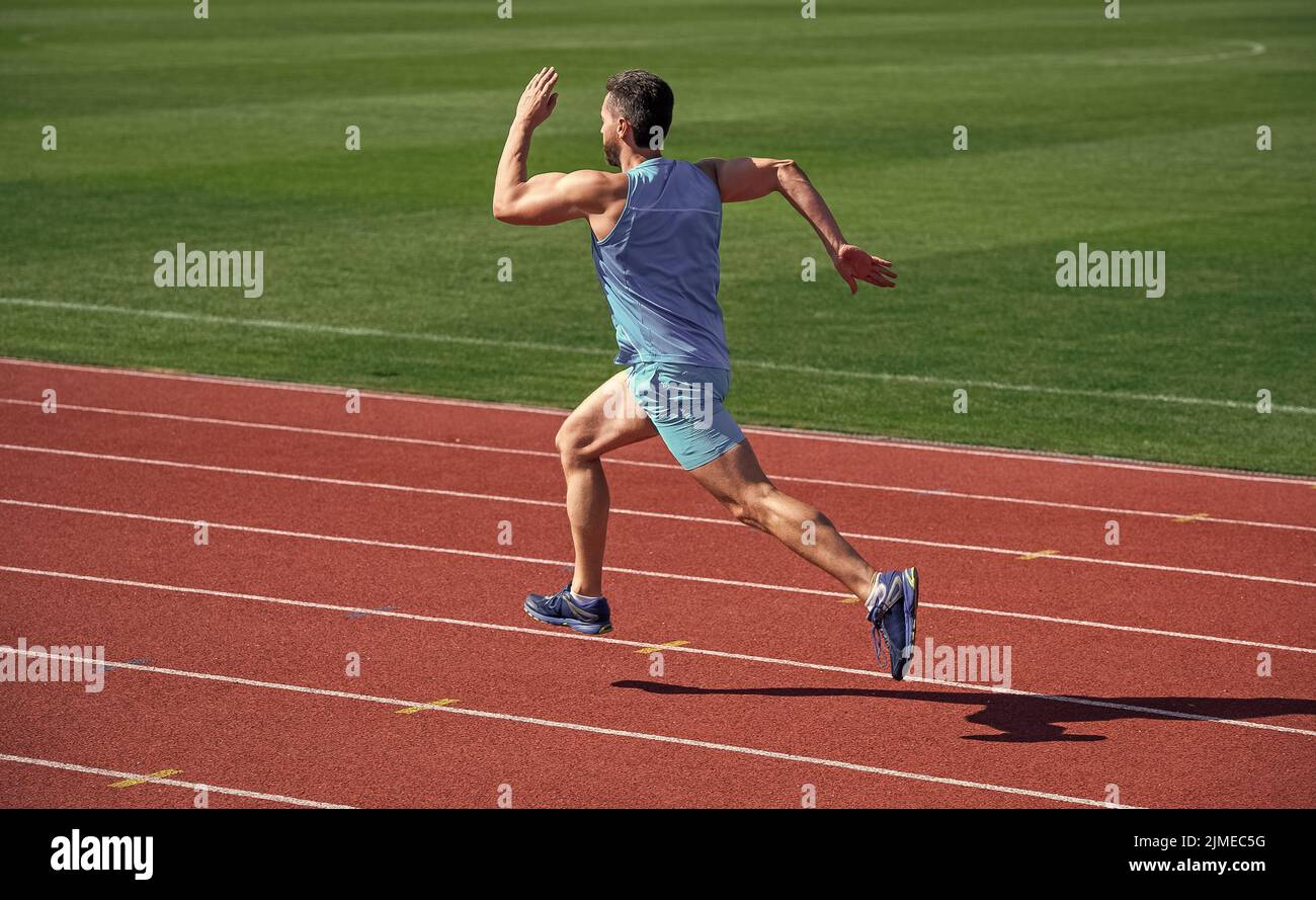 athlete runner do aerobic or anaerobic load. man start running on ...