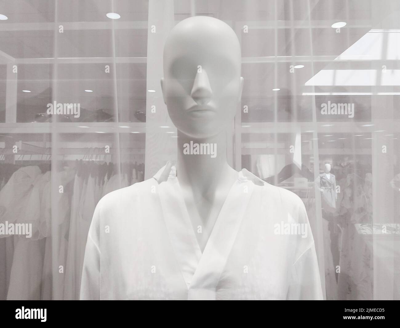 White female mannequin in clothing store window, closeup Stock Photo ...