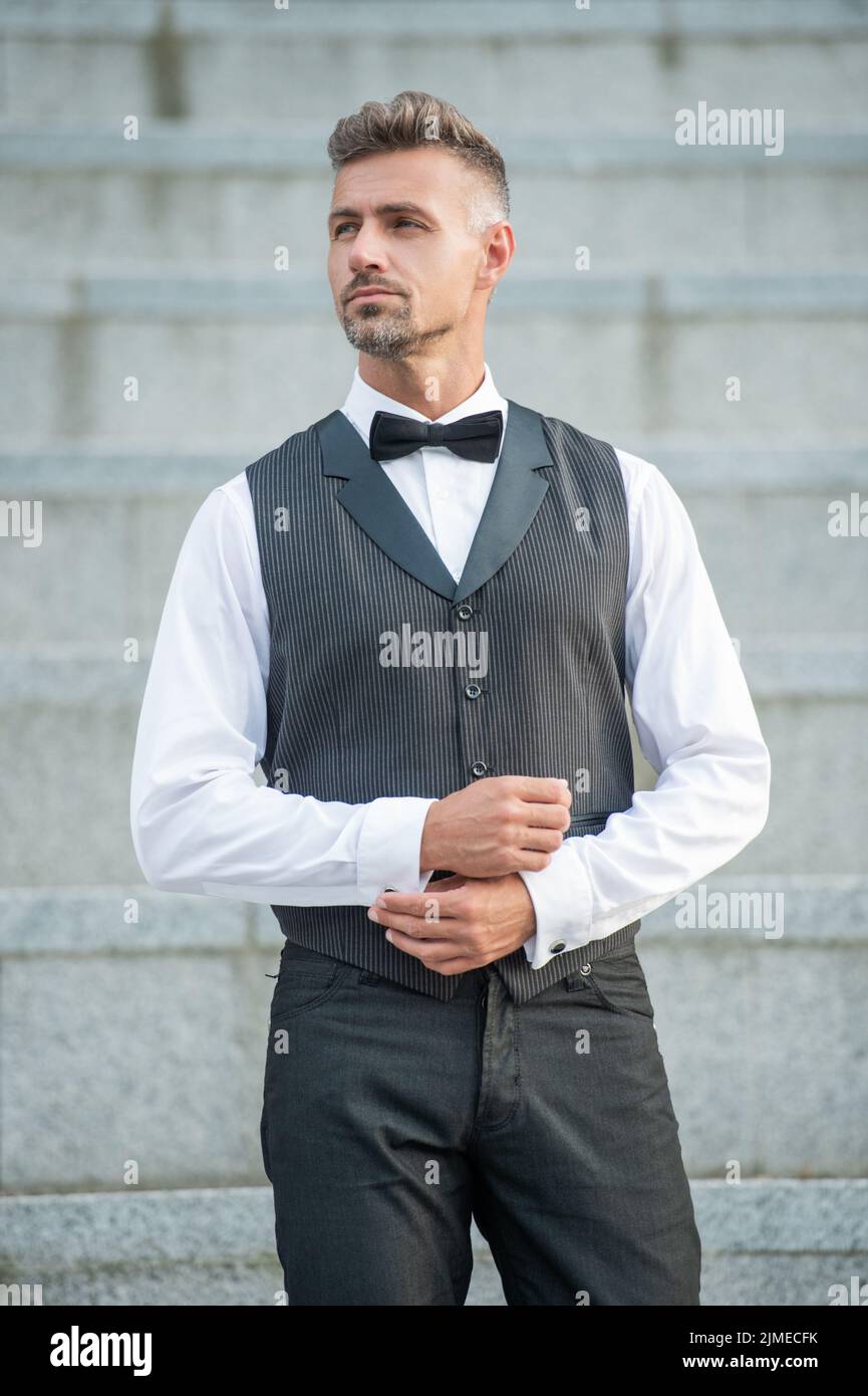 elegant man in bowtie. luxury grizzled man in formalwear. tux man ...