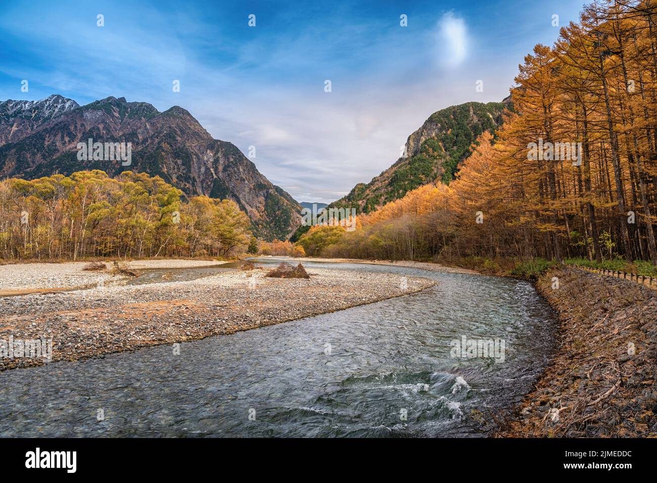 Nature landscape at Kamikochi Japan, autumn fall foliage with pond and ...