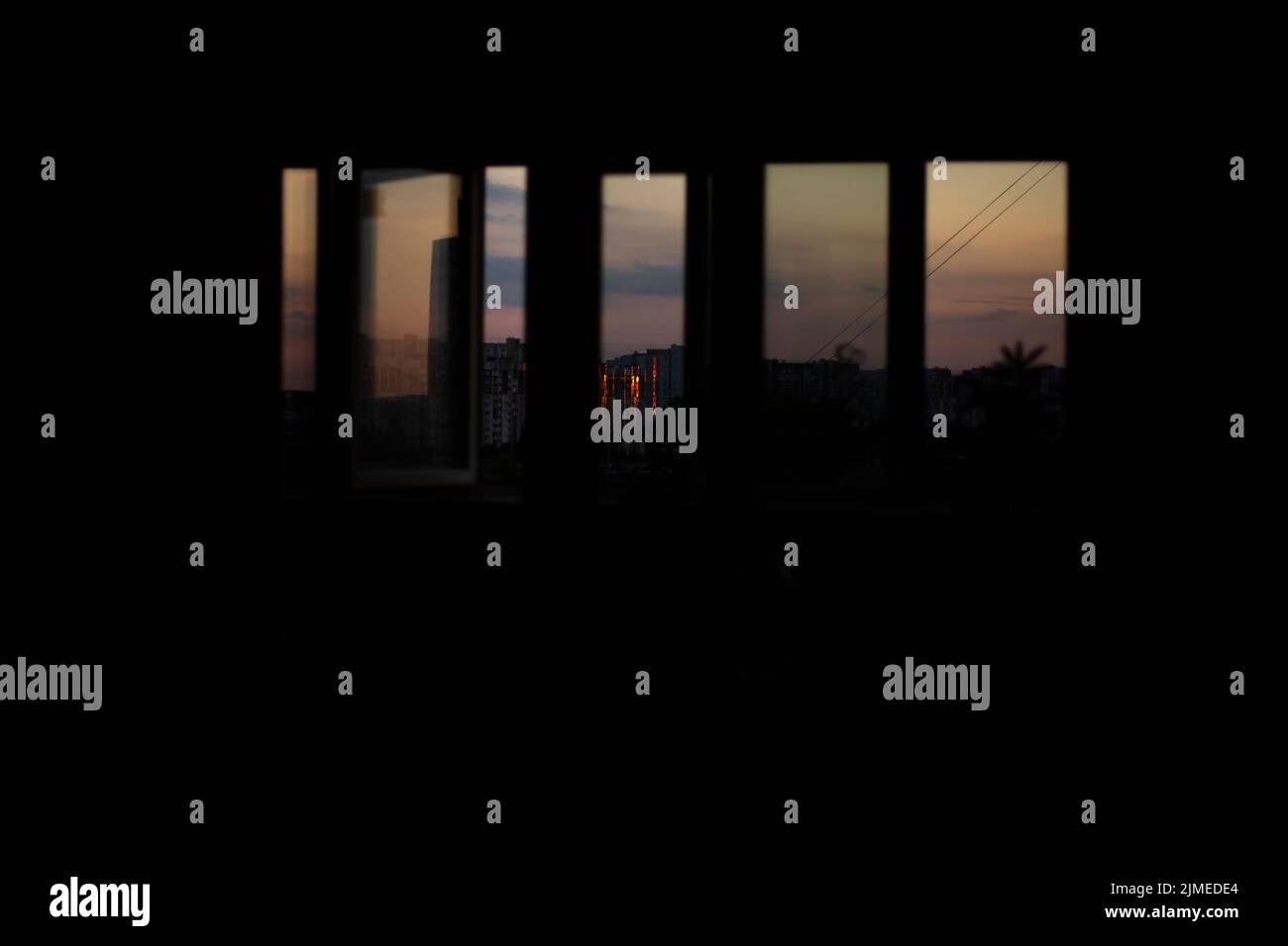 Window in evening. Glass windows in house. Evening sky behind glass ...