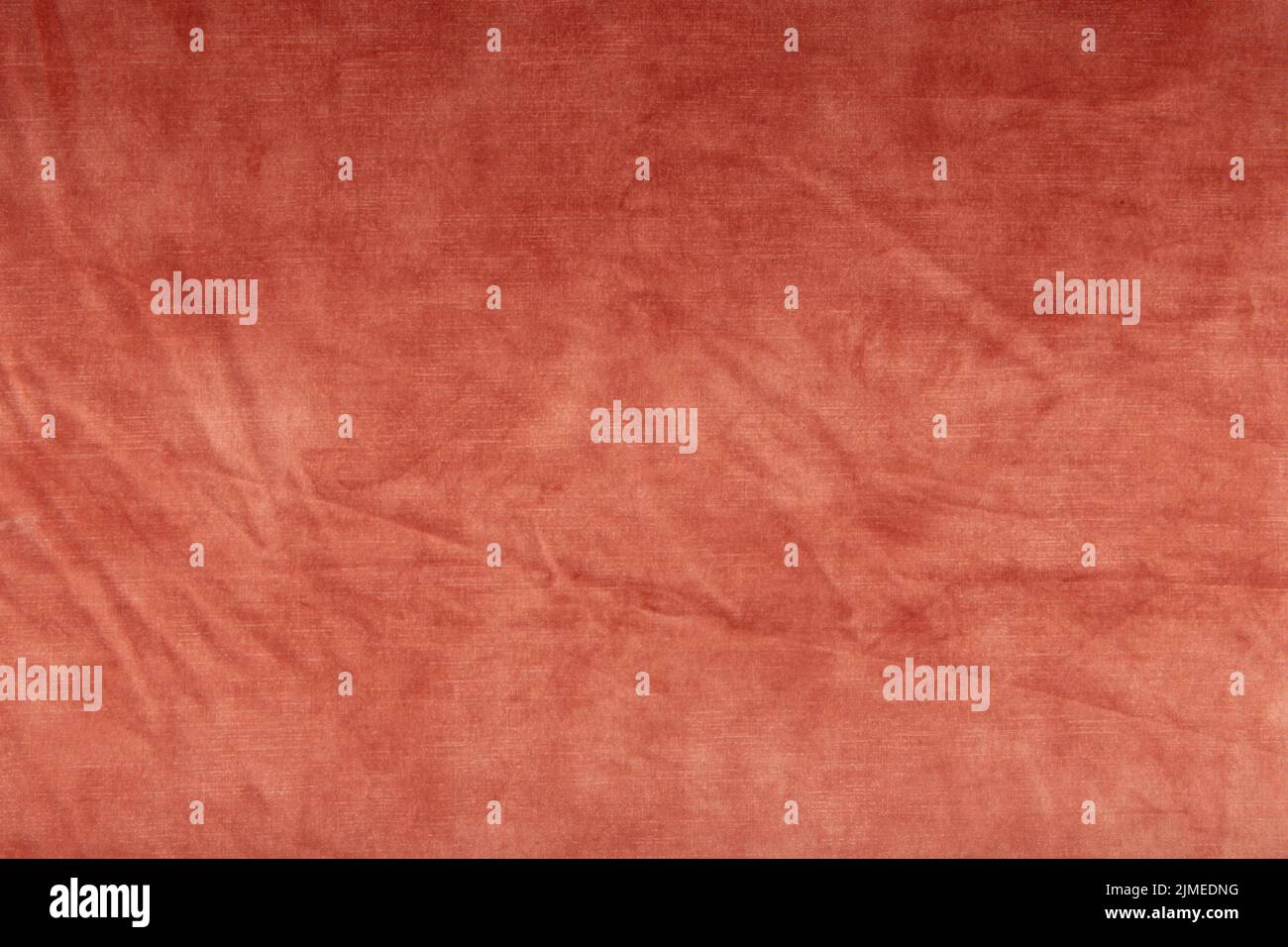 Red velvet texture - top view and close-up of a fragment of crumpled ...