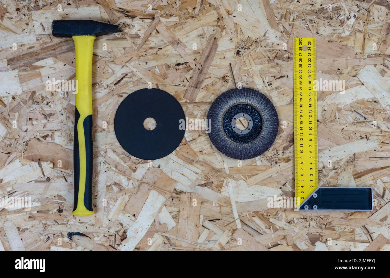 The word TOOL made up of letters collected from construction tools ...