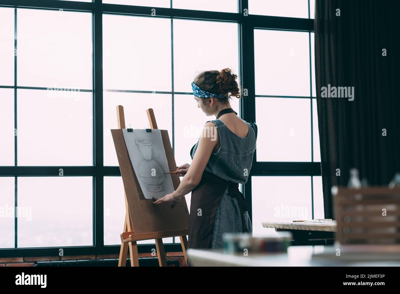 artist work young lady drawing sketch vase window Stock Photo - Alamy