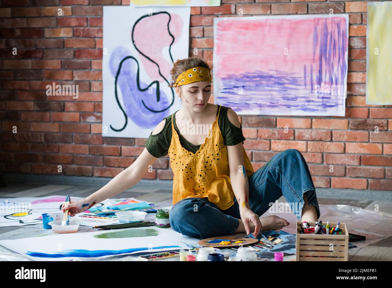 hobby recreation female artist painting artworks Stock Photo - Alamy